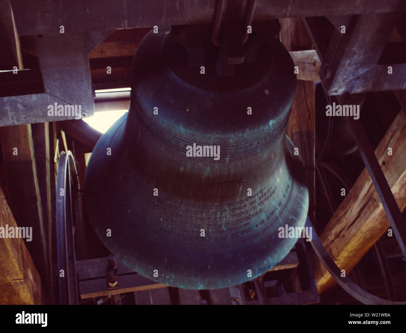 Indoor view of huge metallic bell, inside of church at Netherlnds Stock ...