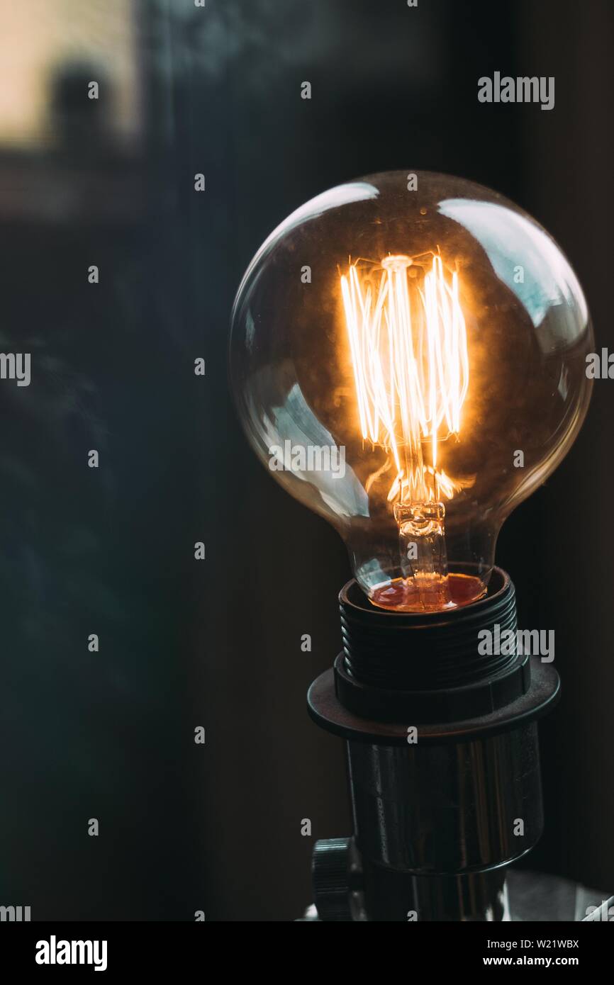 Closeup shot of a high-voltage bright lightbulb in the studio Stock ...