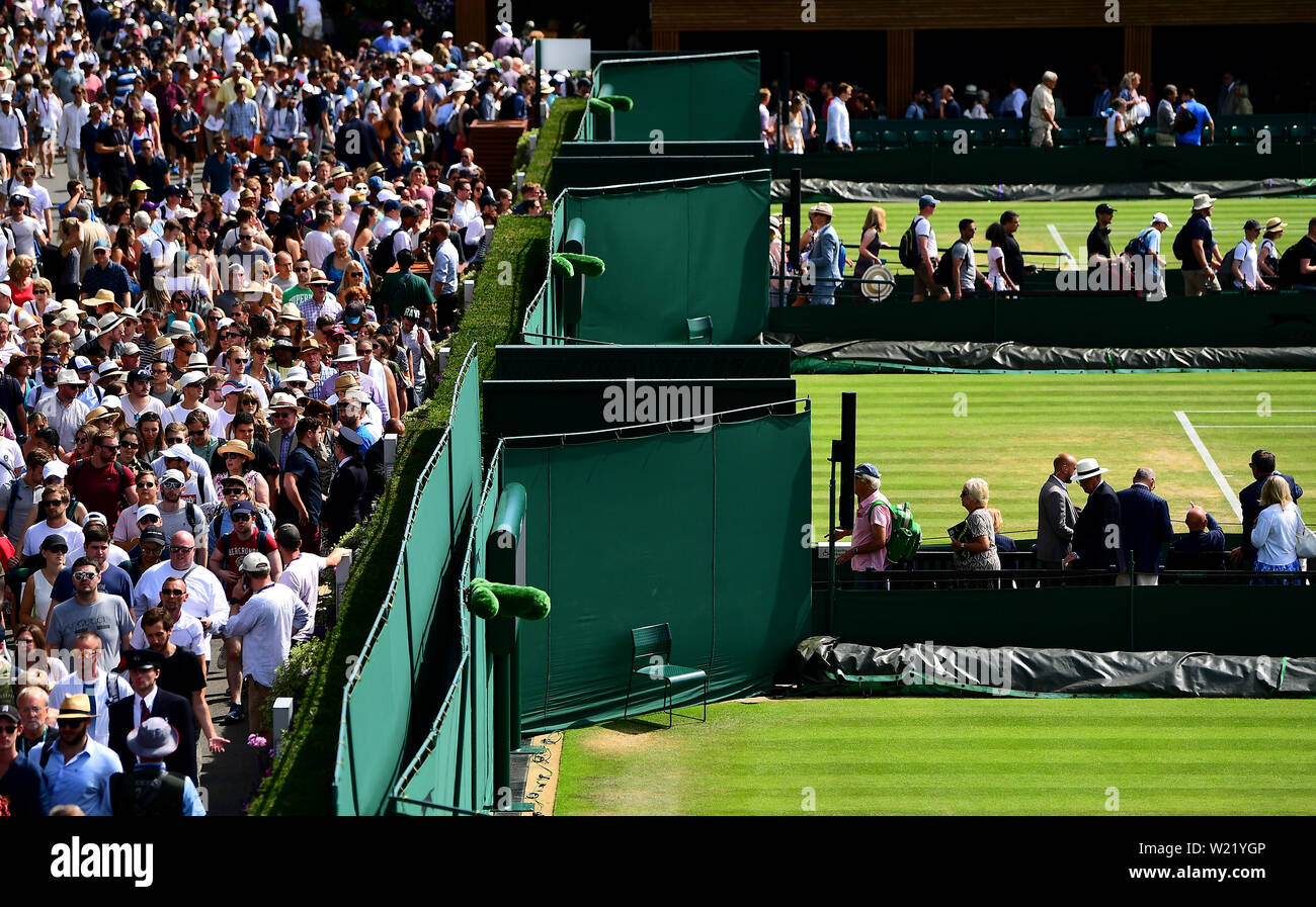 Spectators are led into the grounds at the start of day five of the ...
