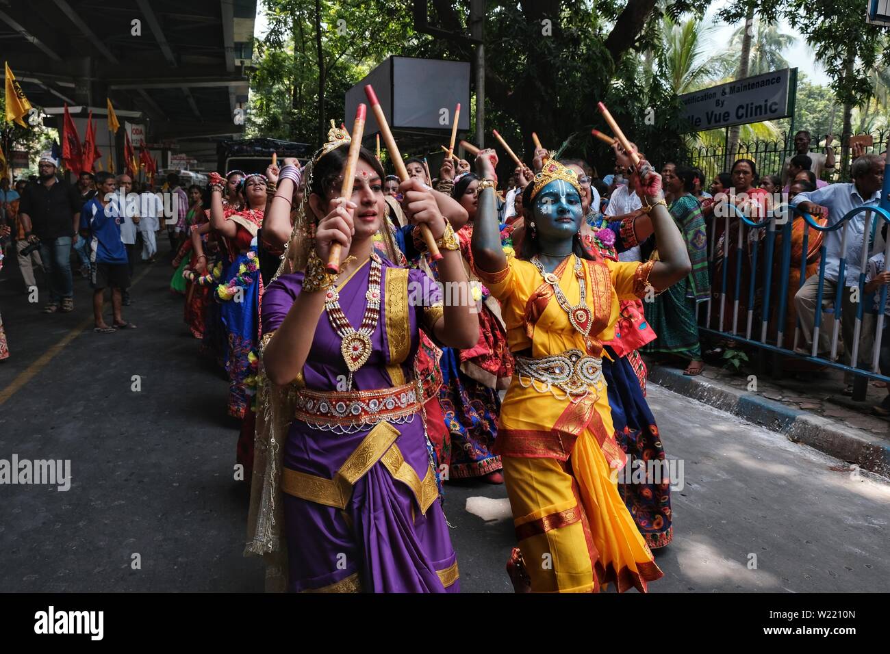 Lord Krishna and his lover Radha is dancing on the street. (Photo by ...
