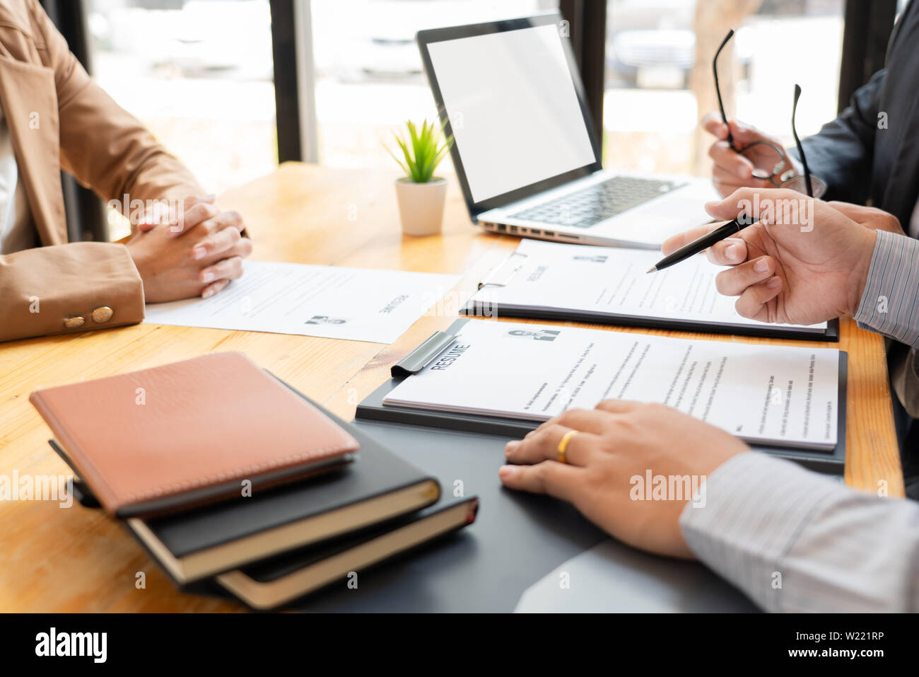 businessman professional women in suit explaining about her profile to ...