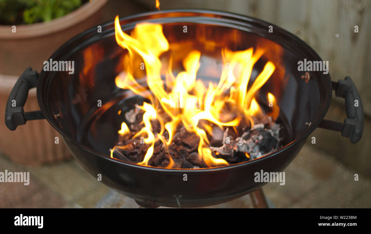 English garden barbecue Stock Photo - Alamy