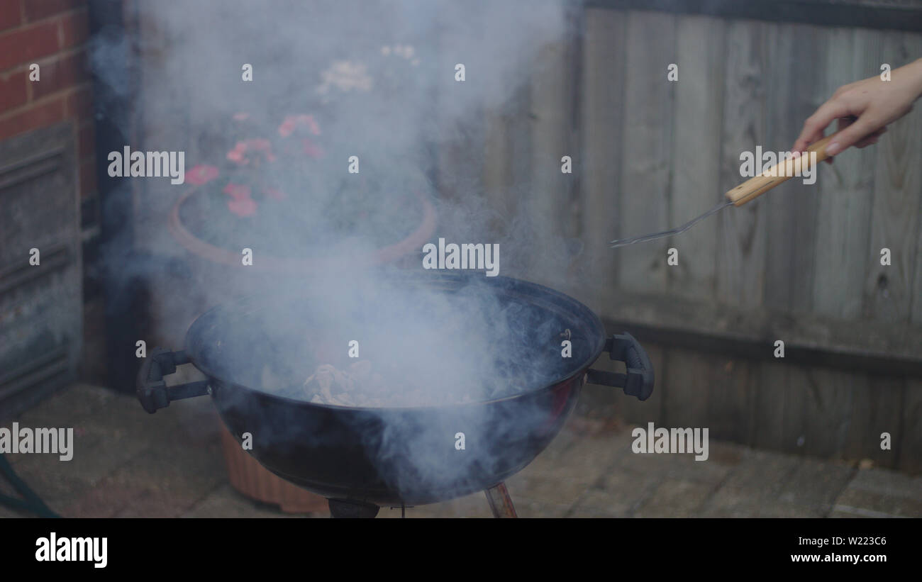 English garden barbecue Stock Photo - Alamy