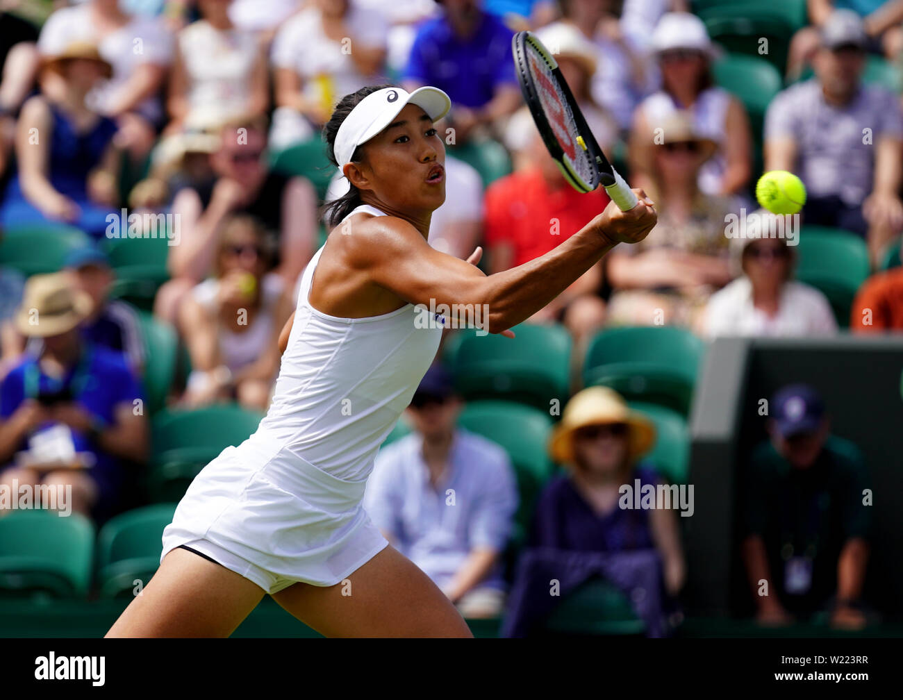 Shuai Zhang in action against Caroline Wozniacki on day five of the ...