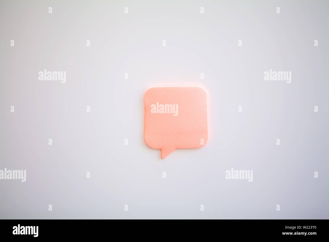 Stickers on white wall. Empty Space for text Stock Photo - Alamy
