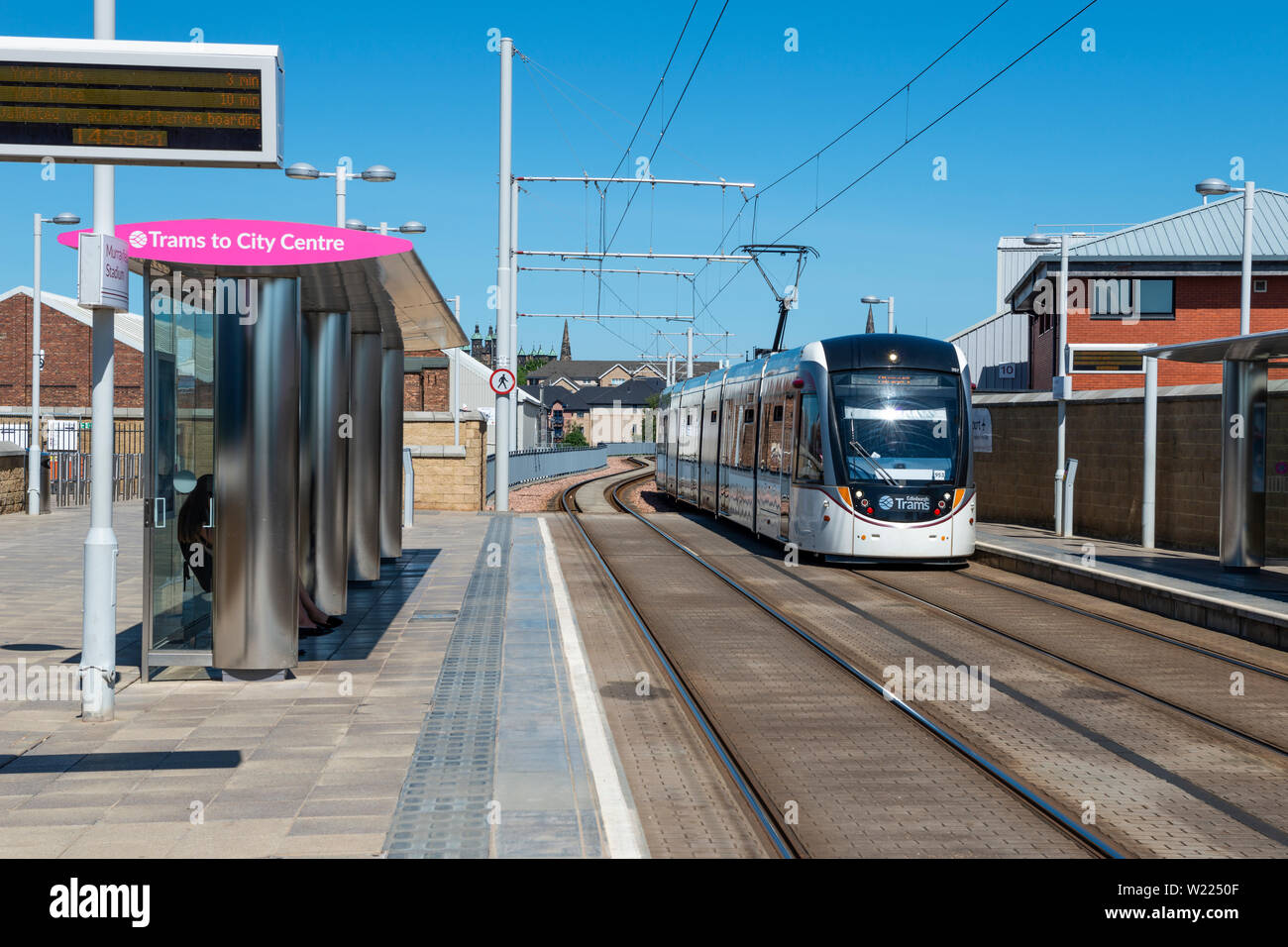 Tram from city centre approaching Murrayfield Stadium tram stop in ...