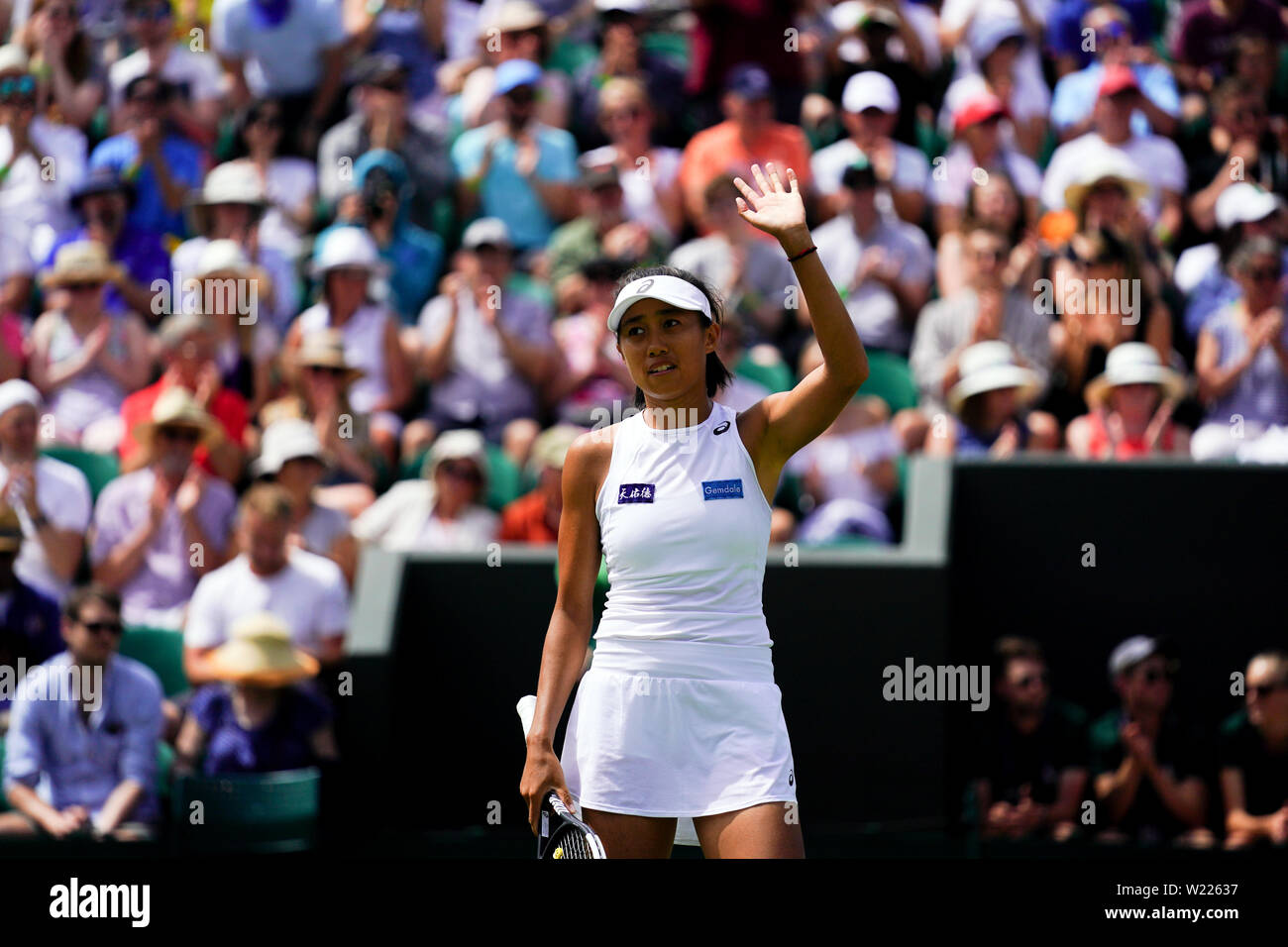 Shuai Zhang celebrates victory over Caroline Wozniacki on day five of ...