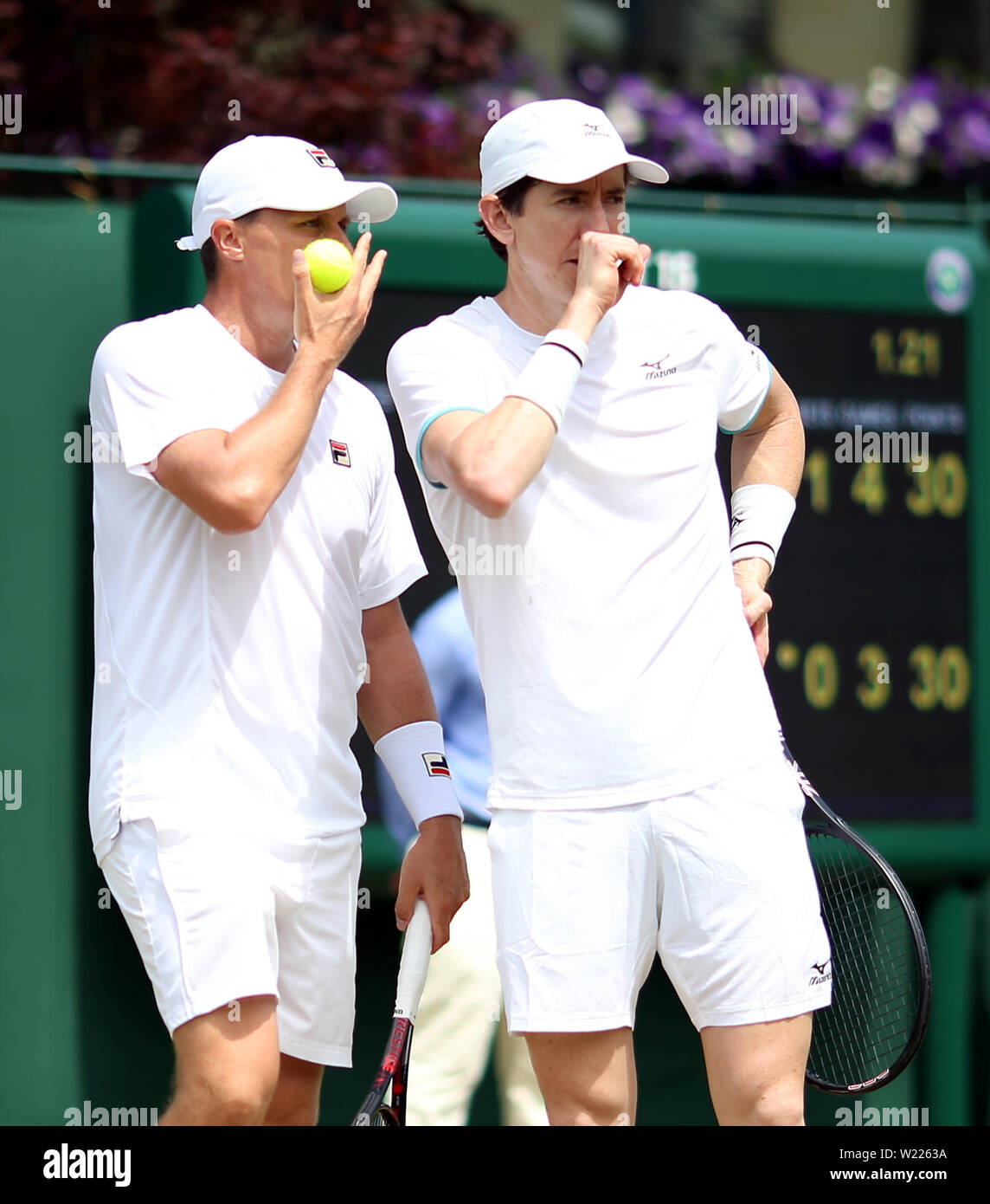 Ken Skupski (left) and John-Patrick Smith in action during their mens ...