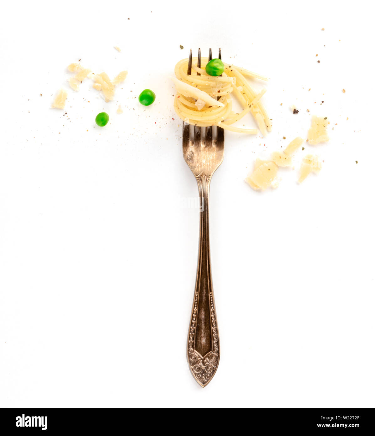 Italian pasta design. A fork with spaghetti, green peas, parmesan ...