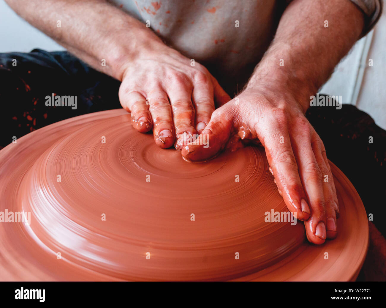 Professional potter making bowl in pottery workshop, studio Stock Photo ...
