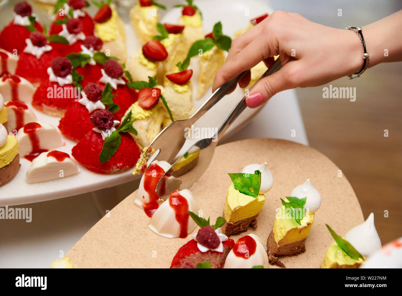 Buffet table with various cakes.Catering Stock Photo - Alamy