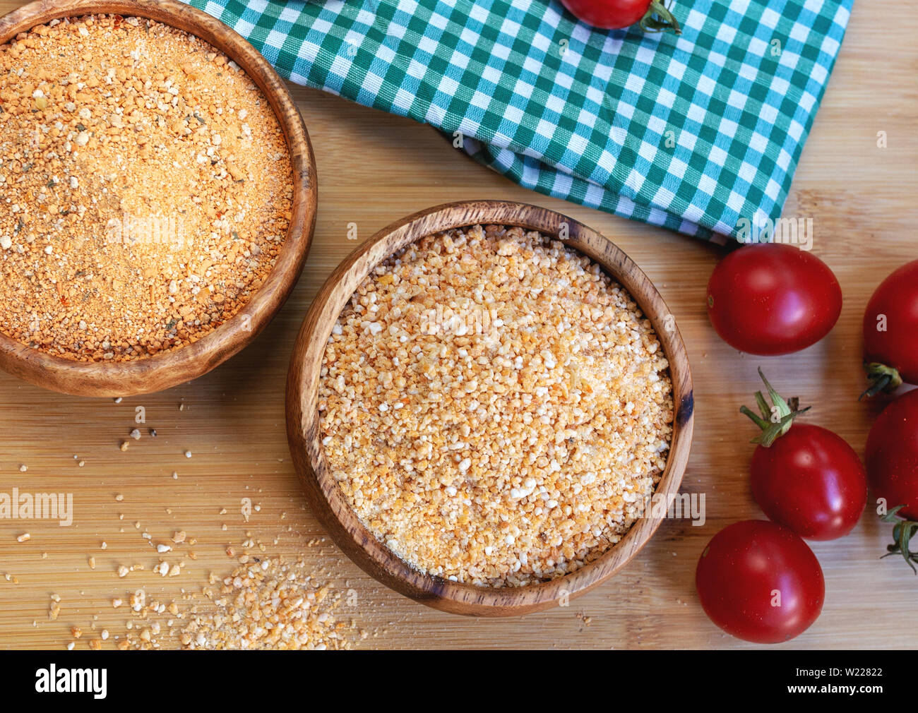 Turkish traditional tarhana (uncooked) and tomatoes on wooden ...