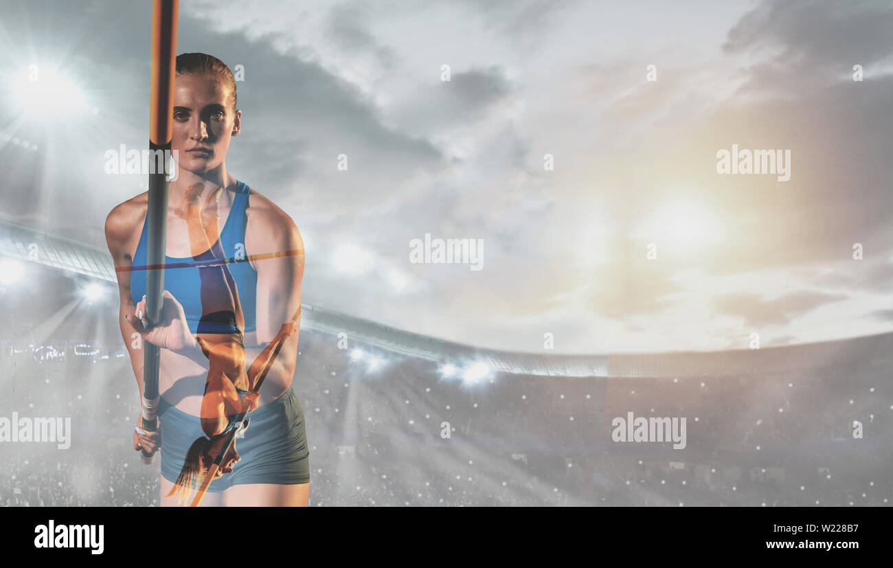 Professional female pole vaulter training at the stadium. Double ...