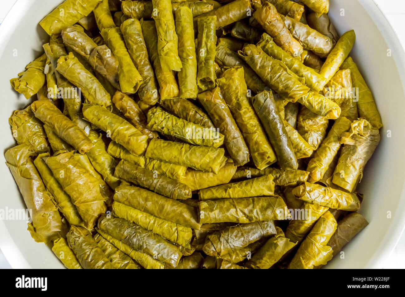 Top view of traditional Turkish meal, vine leaves stuffed with seasoned ...