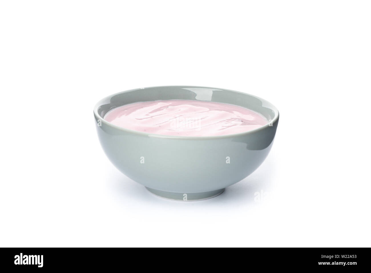 Bowl with fruit yogurt isolated on white background Stock Photo - Alamy