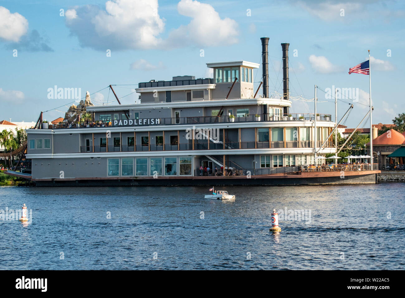 Orlando, Florida. June 15, 2019. Paddlefish on sunset background. It is ...