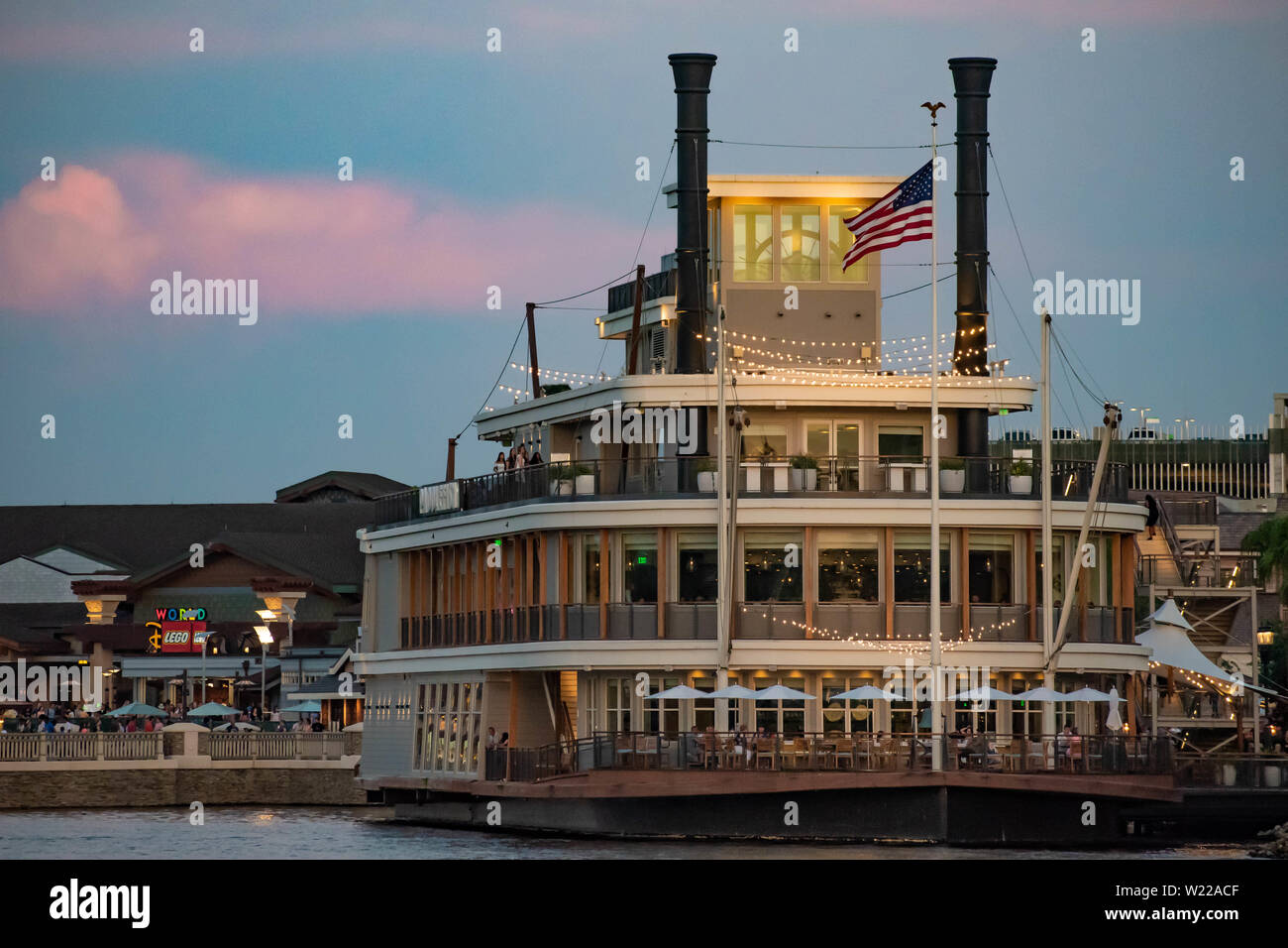 Orlando, Florida. June 15, 2019. Paddlefish on sunset background. It is ...