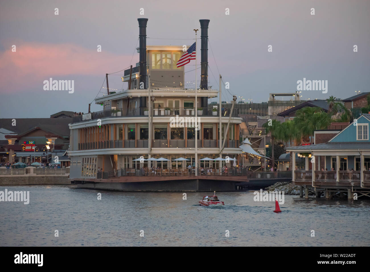 Orlando, Florida. June 15, 2019. Paddlefish on sunset background. It is ...