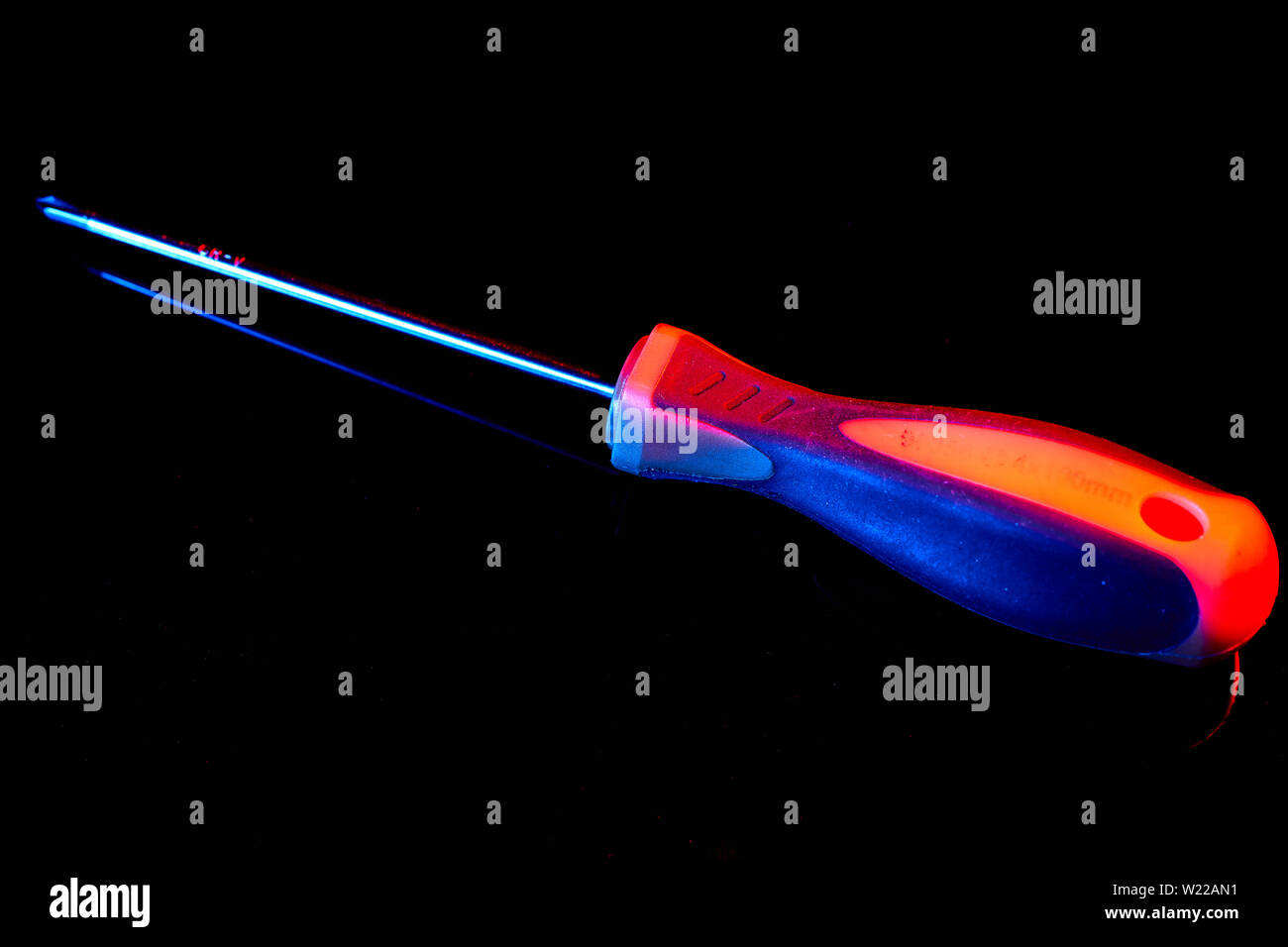 Screwdriver on black background with reflection. Mixed lighting Stock ...