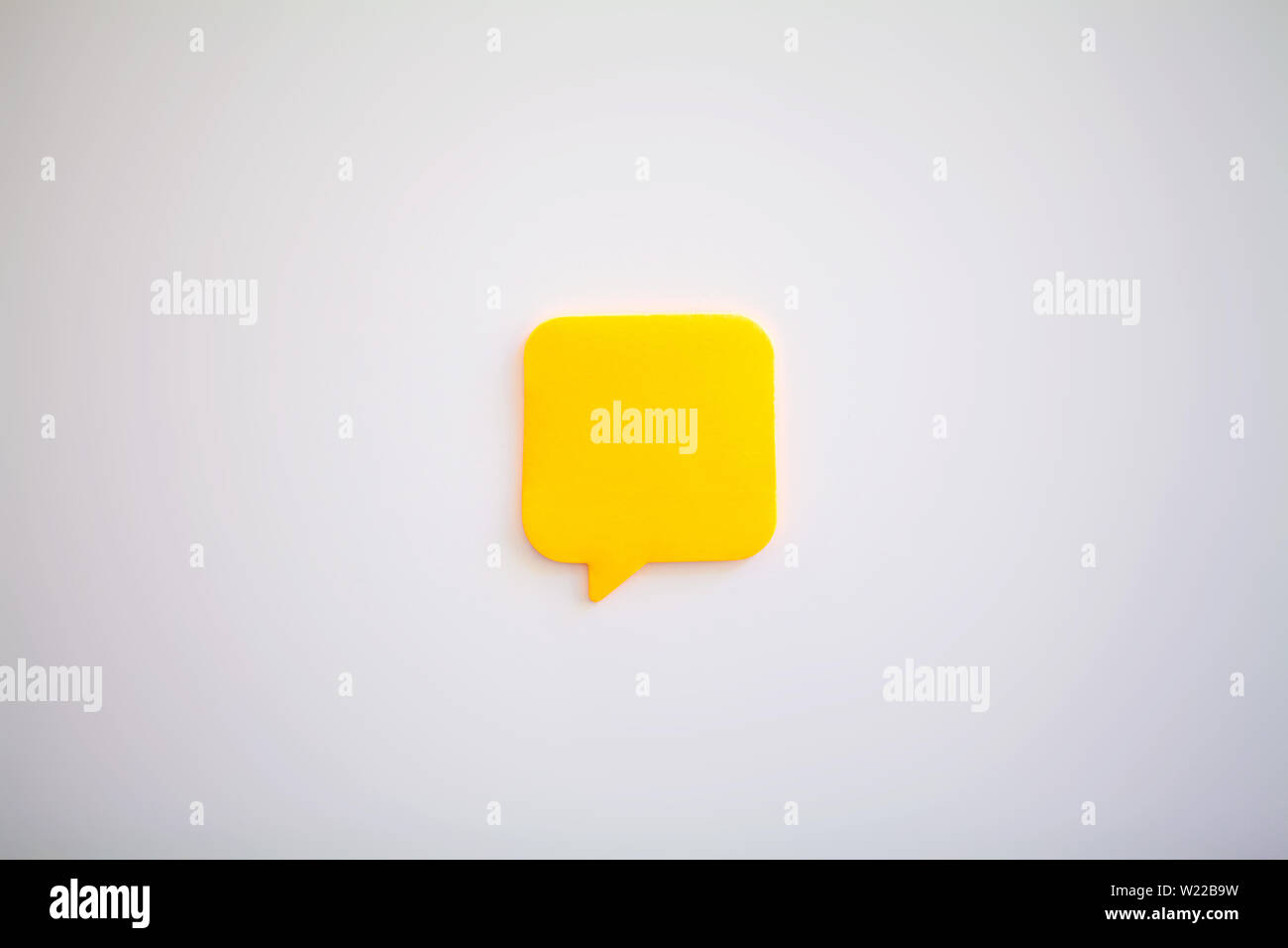 Stickers on white wall. Empty Space for text Stock Photo - Alamy