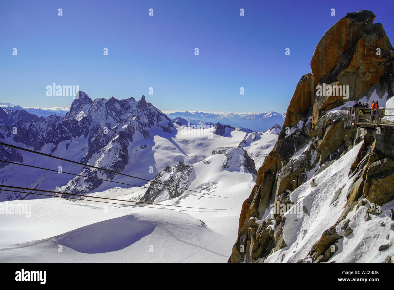 View of Aiguille Du Midi cable car station. Mont Blanc massif in the ...