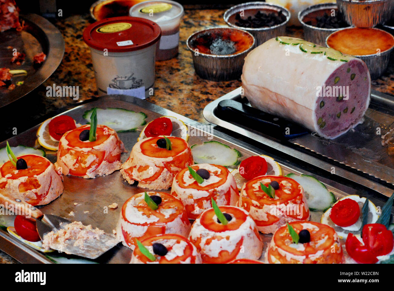 A delectable display of gourmet meat, puddings, pates and cheese dishes ...