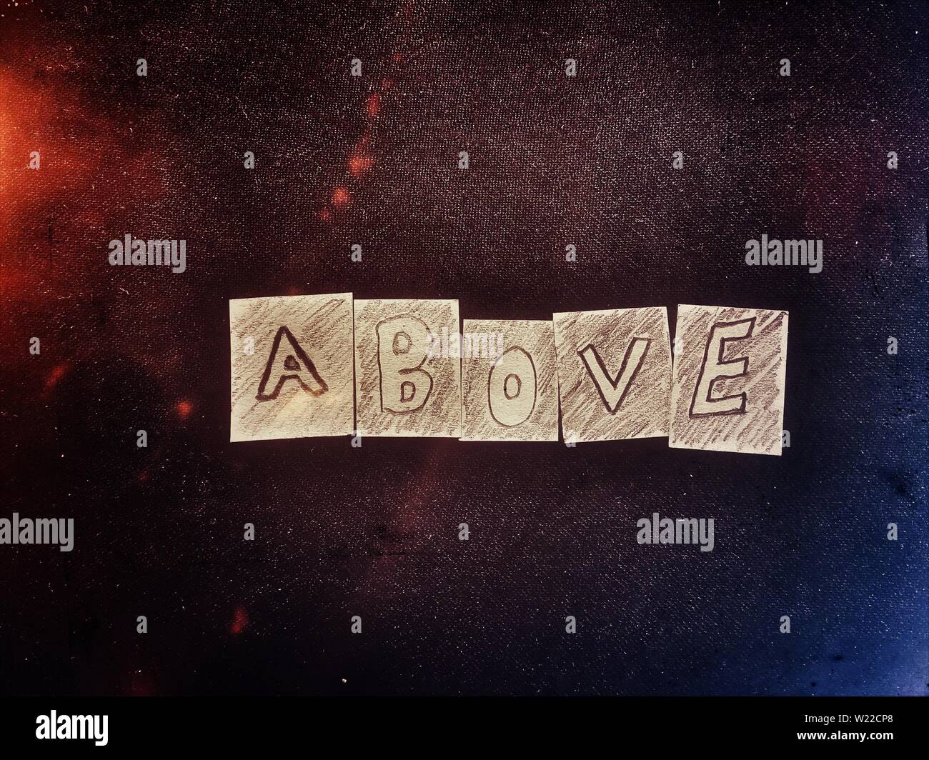 on the dark black background the word able on he paper Stock Photo - Alamy