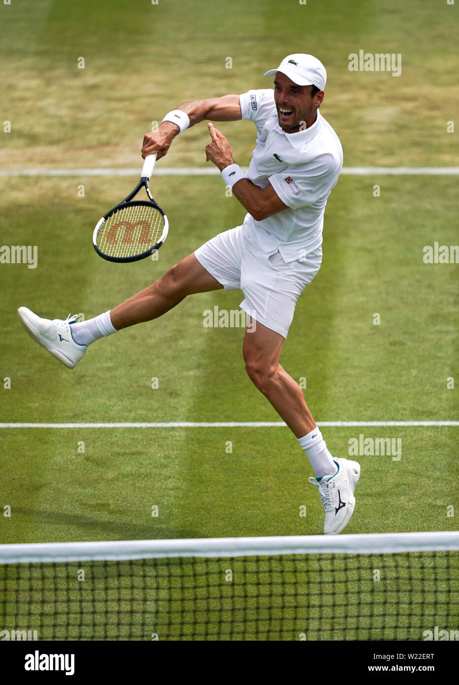 Roberto Bautista Agut in action against Karen Khachanov on day five of the Wimbledon ...