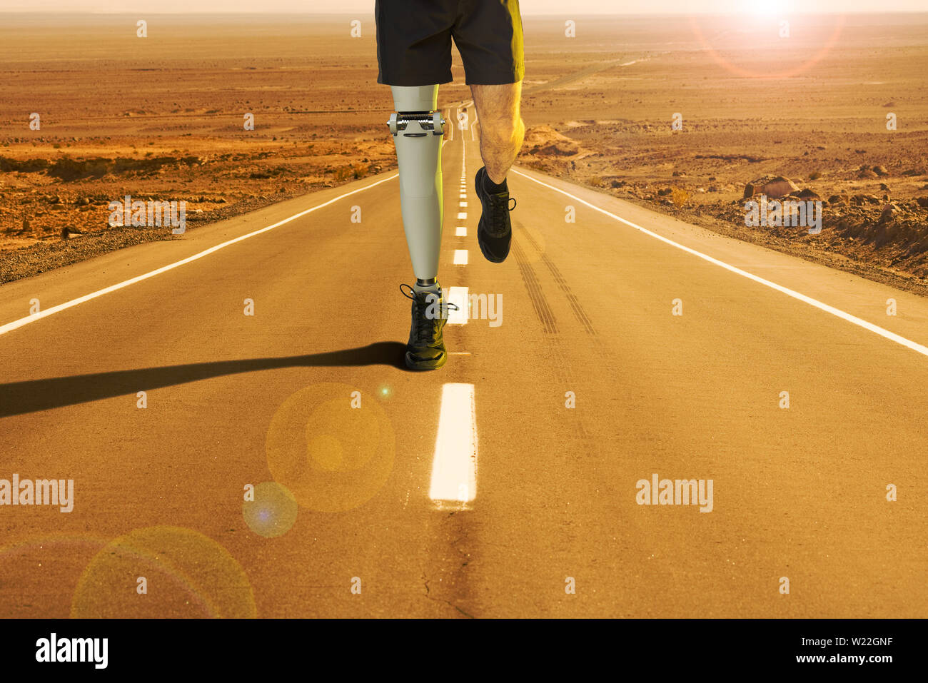 A runner crossing the desert an orthopedic leg Stock Photo - Alamy