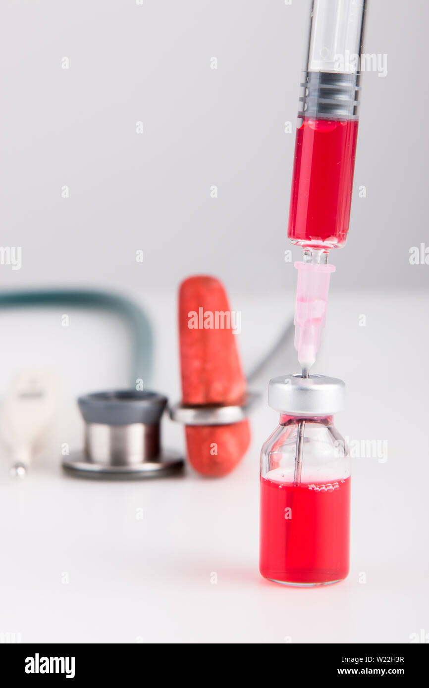 Medical vials for injection with a syringe Stock Photo - Alamy