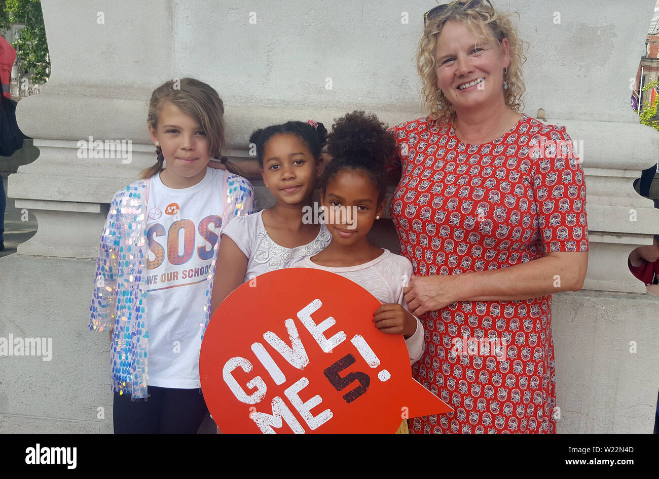 Alison Ali of Brighton came to the protest with her 10 year-old twin ...