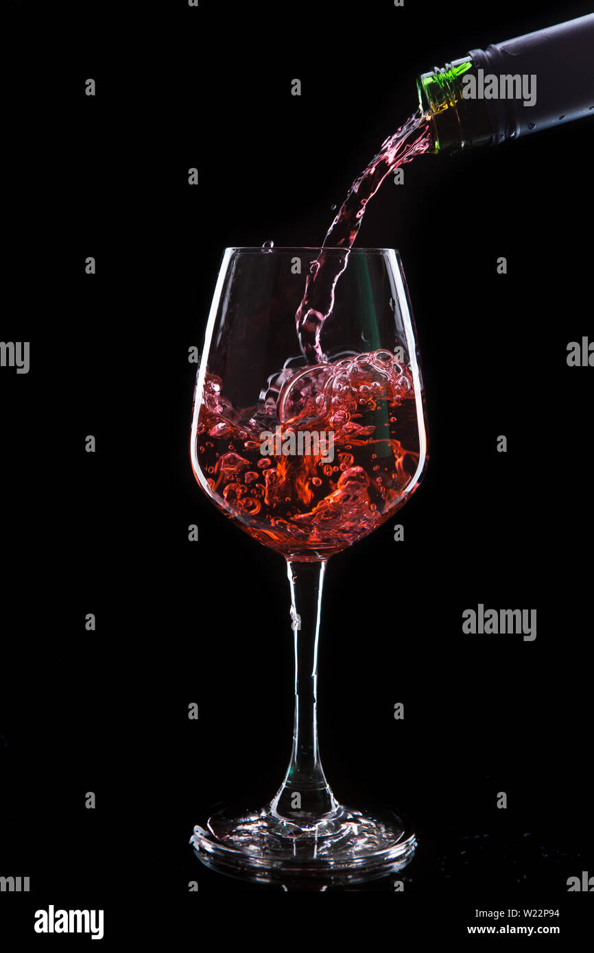 Wine Pouring Black Background