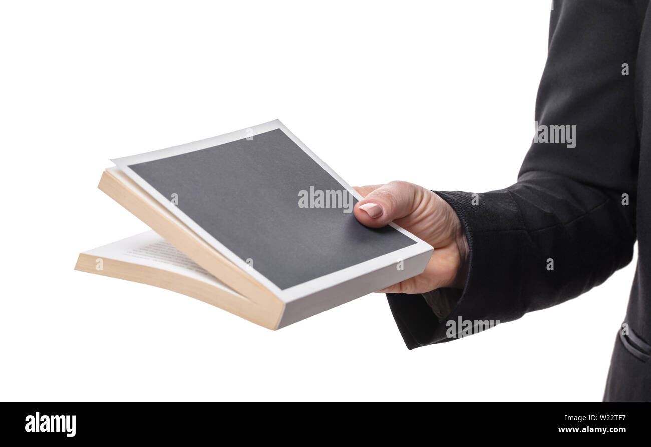 female hand holding book on white isolated background Stock Photo - Alamy