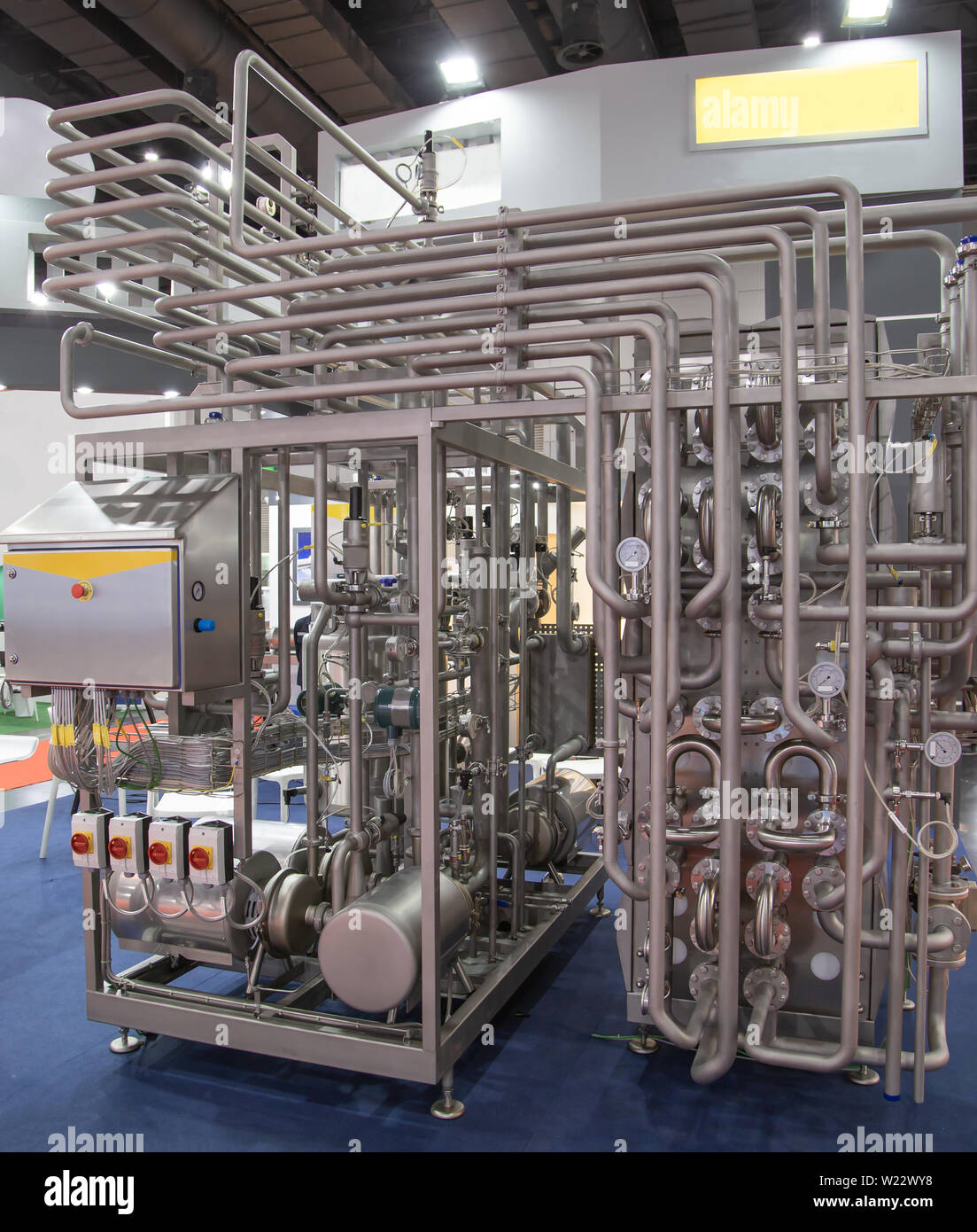 Tubular Aseptic UHT Pasteurizer with Vacuum Deaerator Stock Photo - Alamy