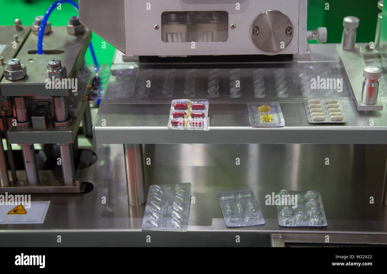Capsule blister packing machine in pharmaceutical industrial Stock ...
