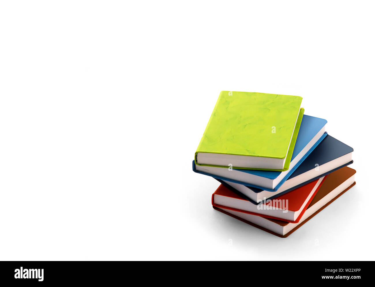 Colorful books isolated on white Stock Photo - Alamy
