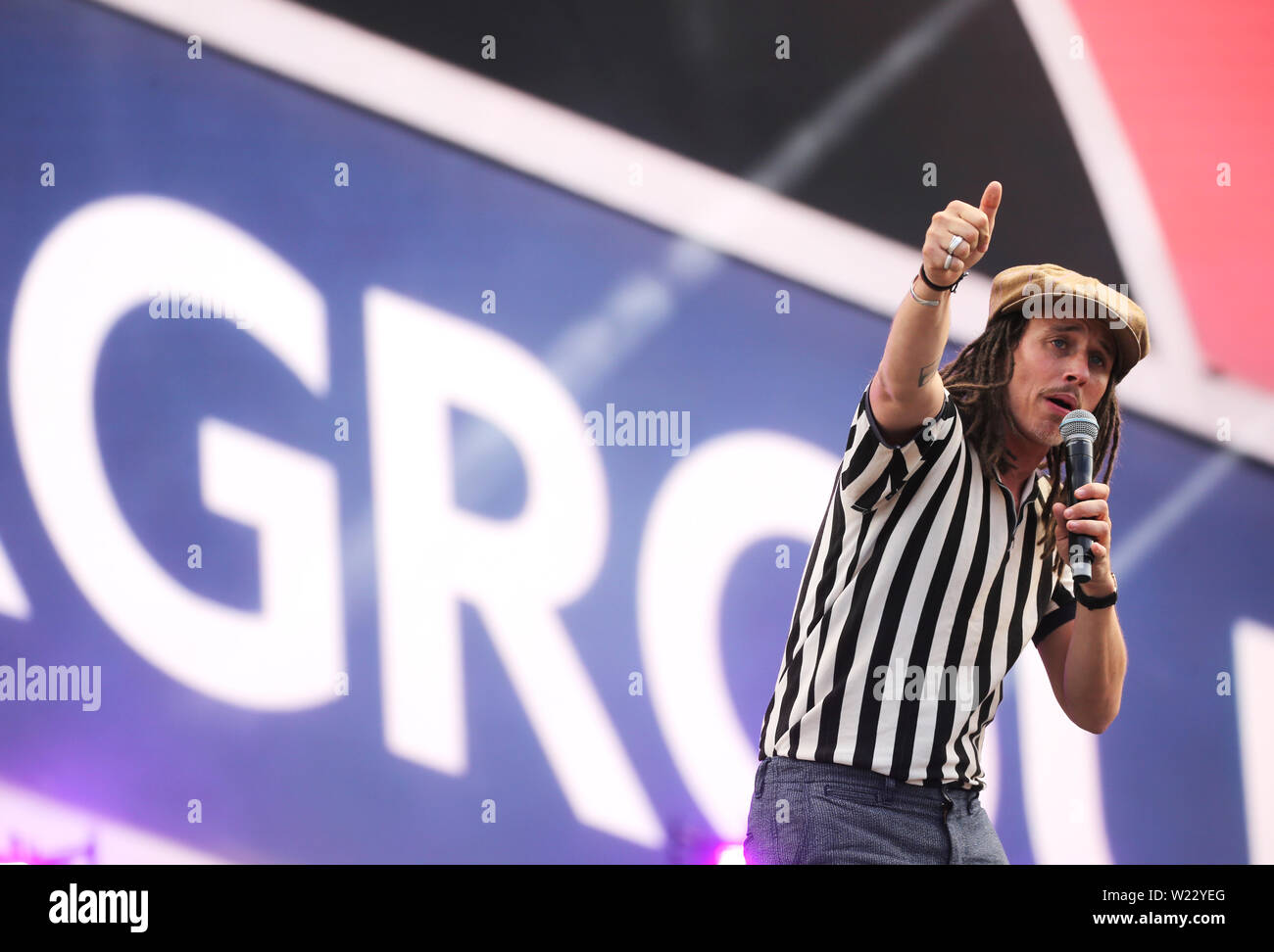 JP Cooper performs on stage with Bugzy Malone on Day 1 of Wireless ...