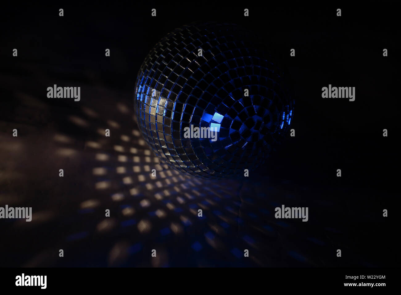 beautiful disco ball on yellow background isolated.photo with copy ...
