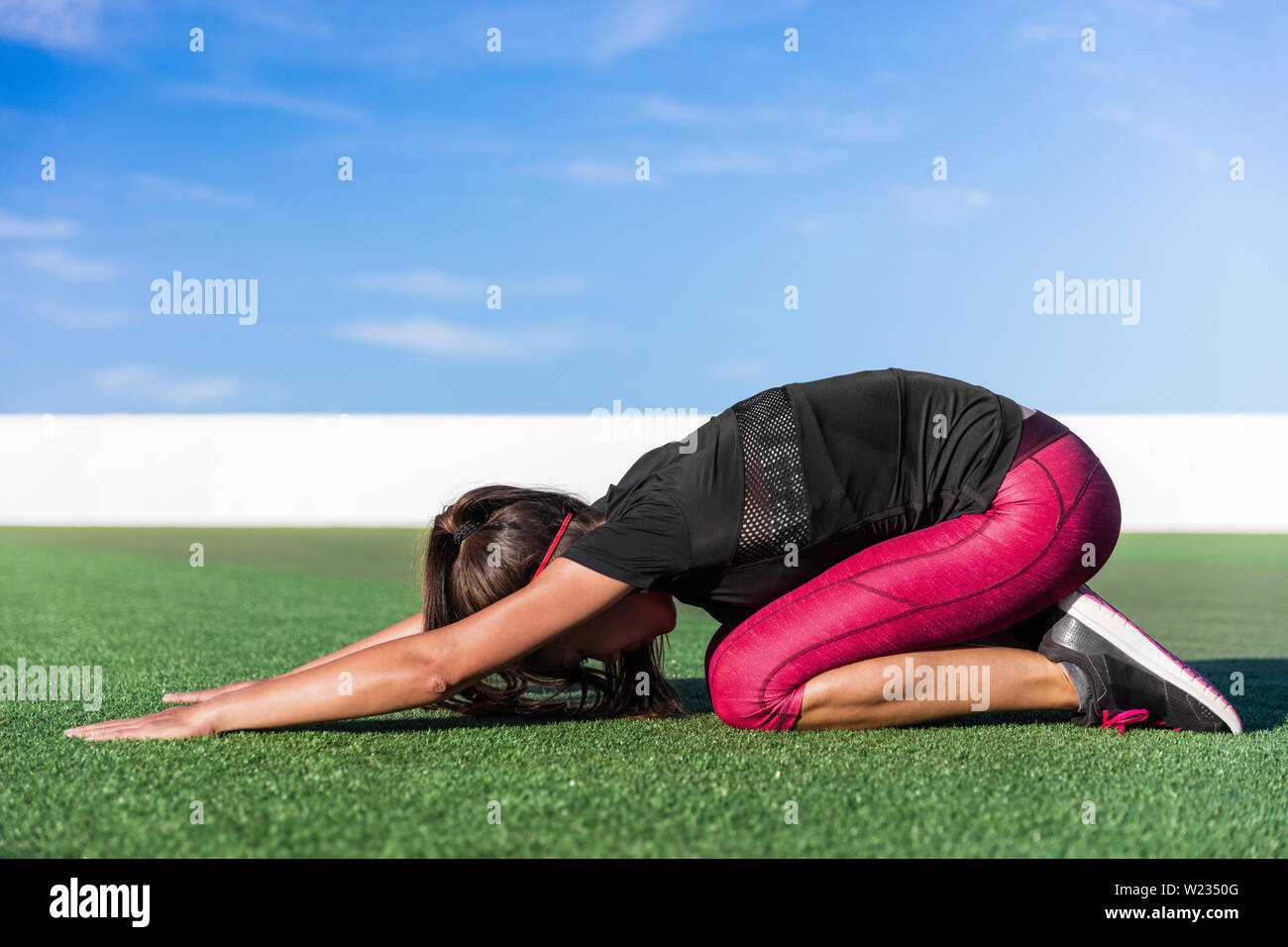 Yoga Asian woman doing back stretches stretching exercises named childs ...
