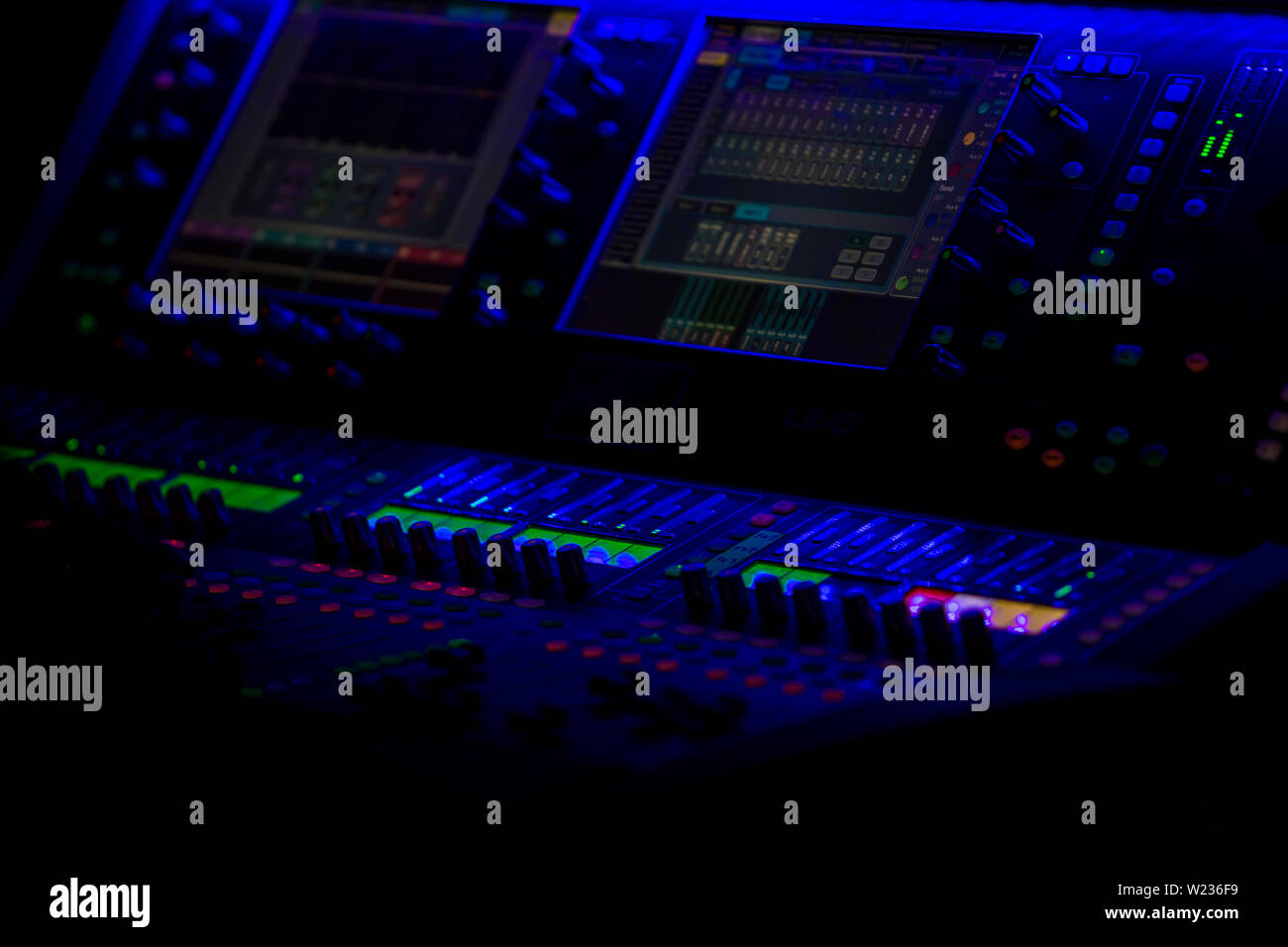Modern mixing console with backlit iluminated controls by blue led ...
