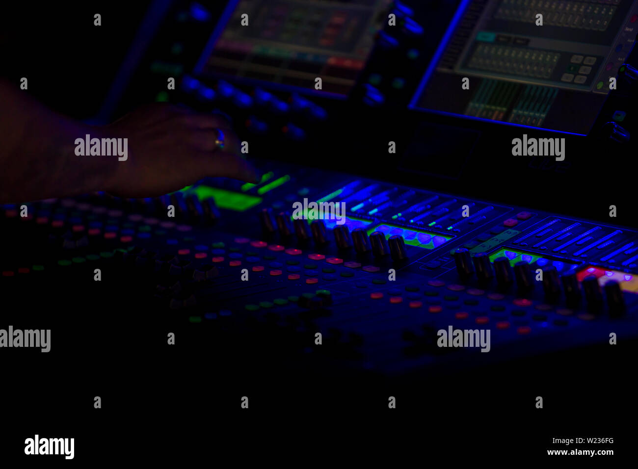 Modern mixing console with backlit iluminated controls by blue led ...