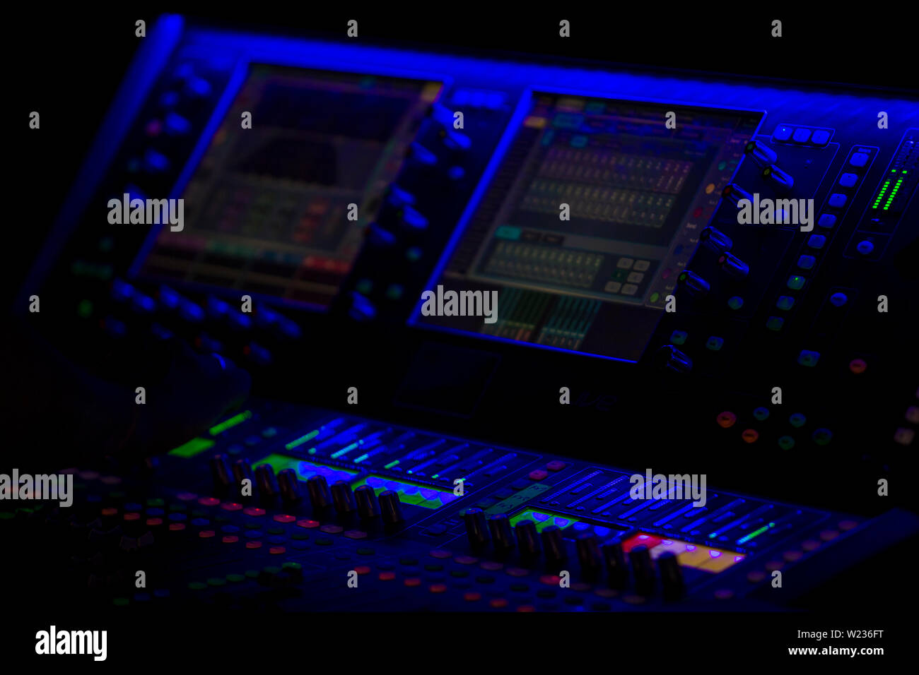 Modern mixing console with backlit iluminated controls by blue led ...