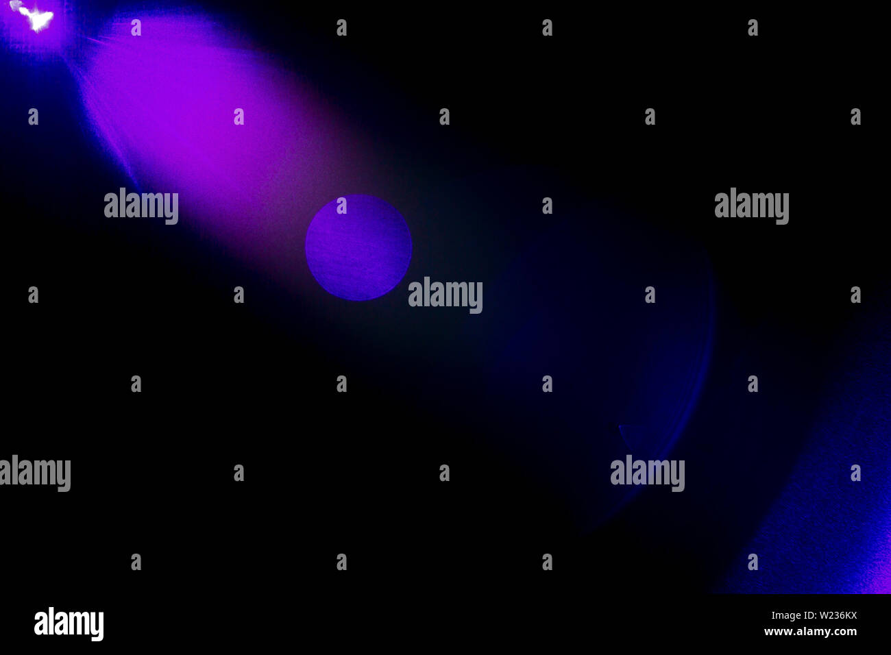 Camera lens flare by laser light create circles of objective and ...