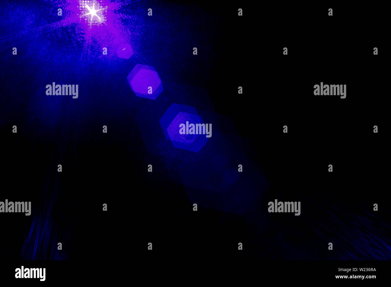 Camera lens flare by laser light create hexagons of objective iris ...