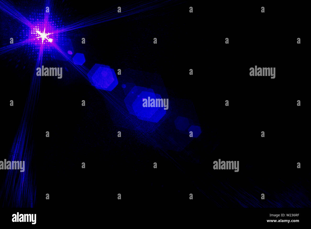 Camera lens flare by laser light create hexagons of objective iris ...