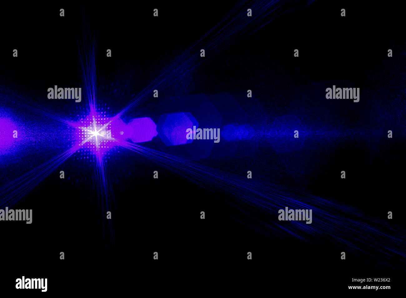 Camera lens flare by laser light create hexagons of objective iris ...