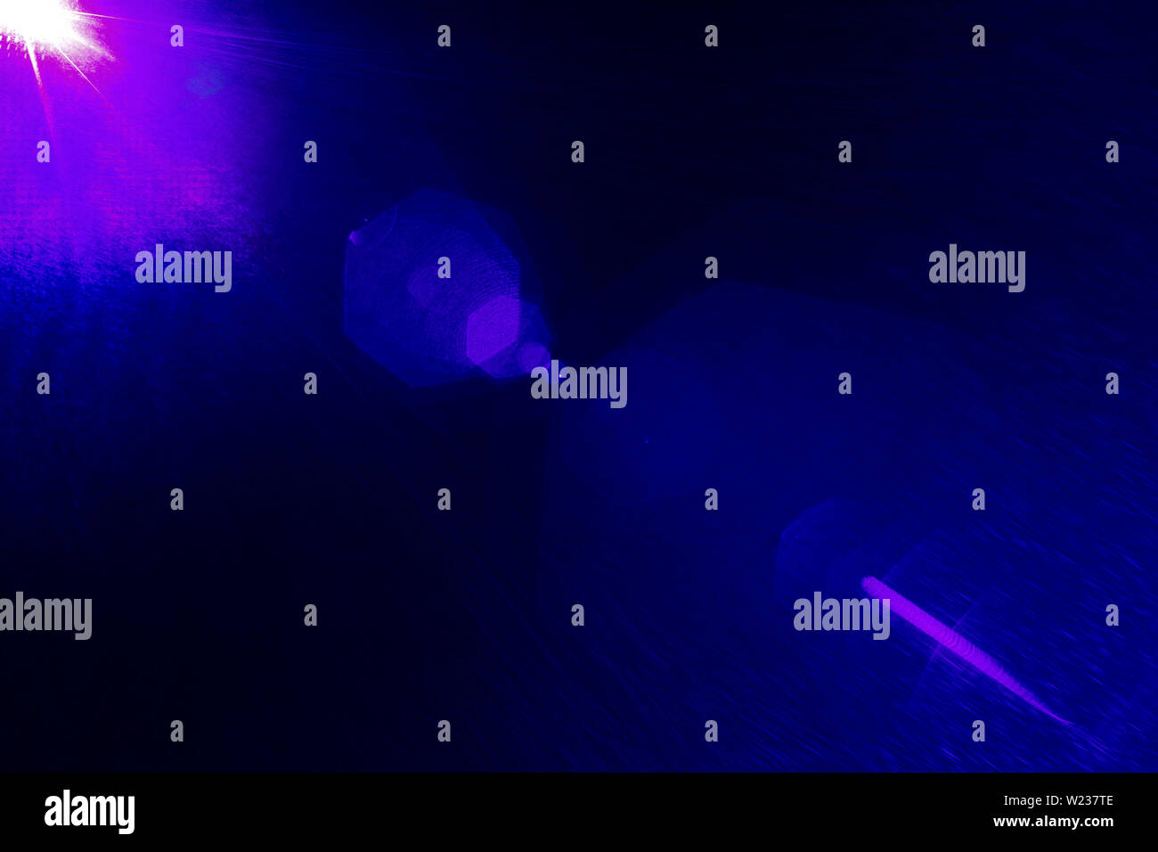 Camera lens flare by laser light create hexagons of objective iris ...