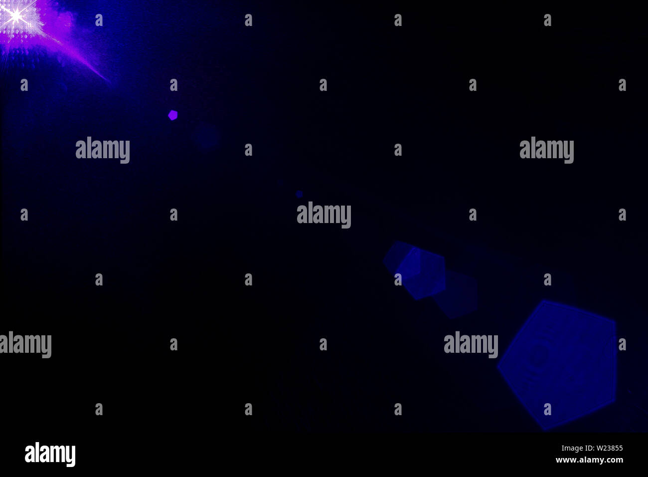 Camera lens flare by laser light create hexagons of objective iris ...