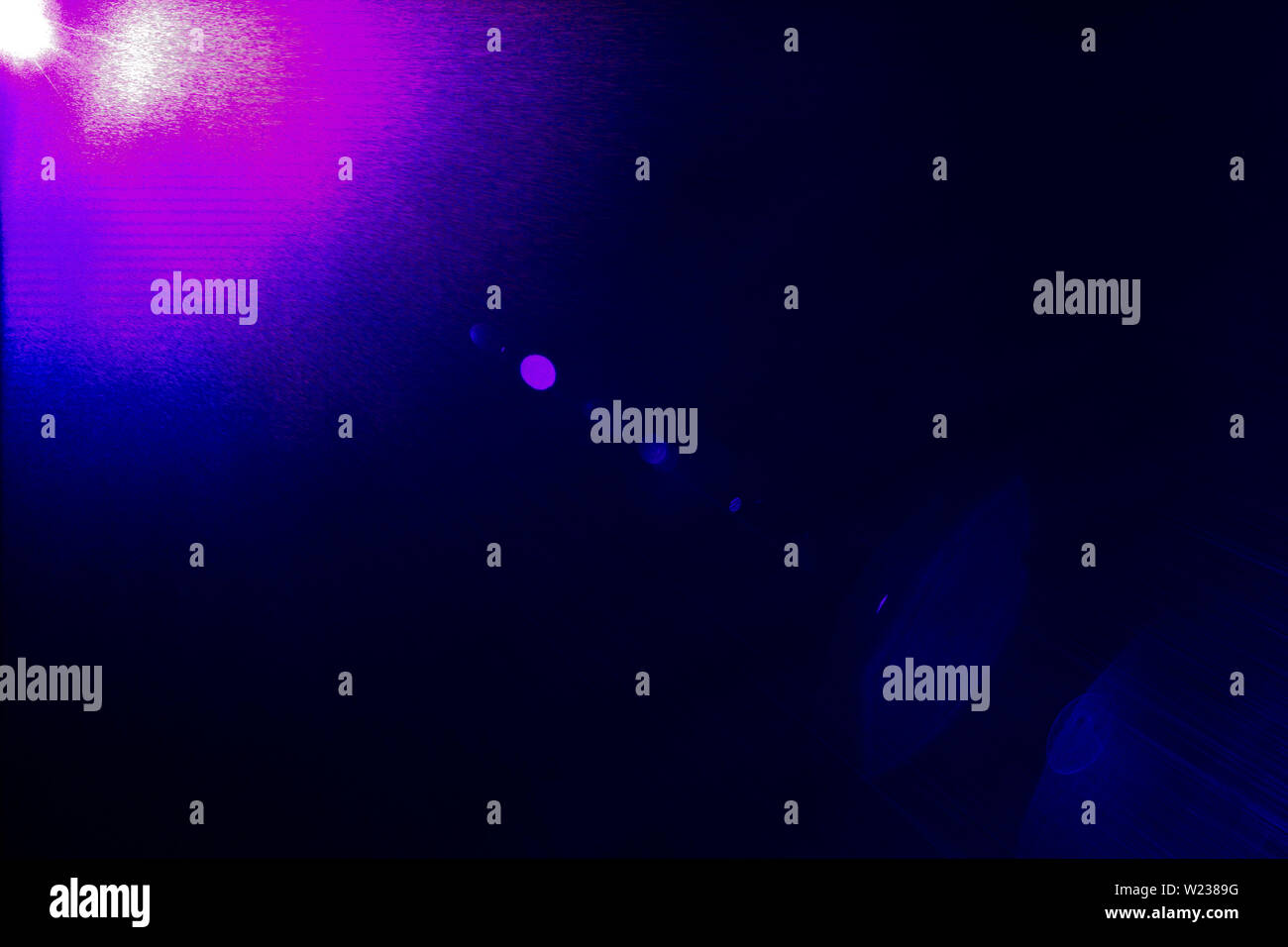 Camera lens flare by laser light create circles of objective and ...