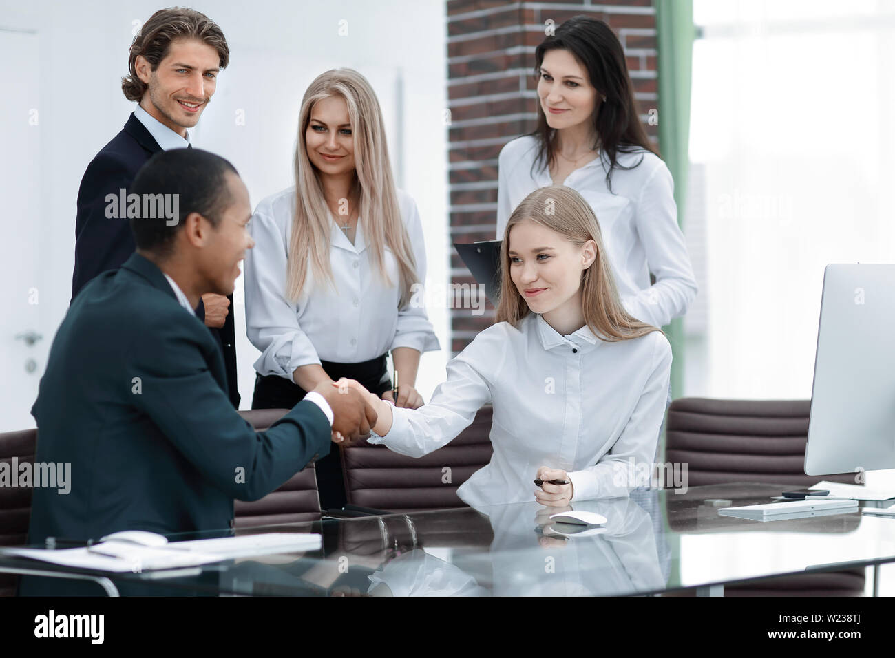business partners conducting a workshop in the office.photo with copy ...